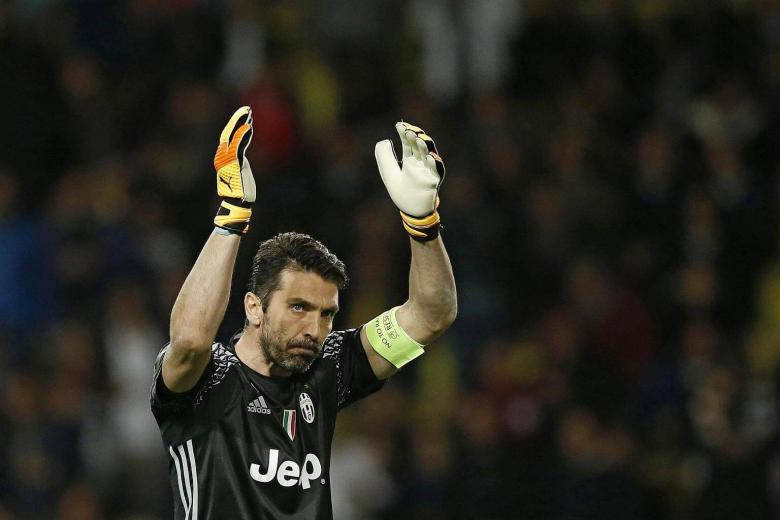 Football: Buffon celebrates 100th Juve Champions League game in style ...