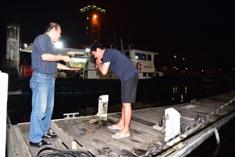 Singaporean fishing boat captain Ricky Tan returns home after being ...