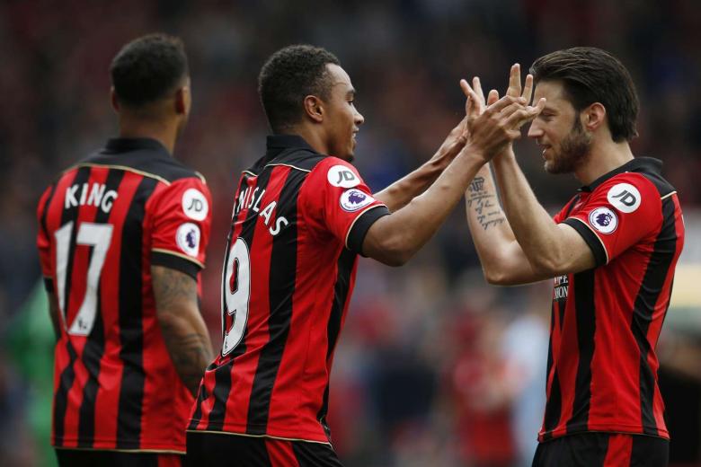 Football: Two own goals as Bournemouth ensure safety | The Straits Times