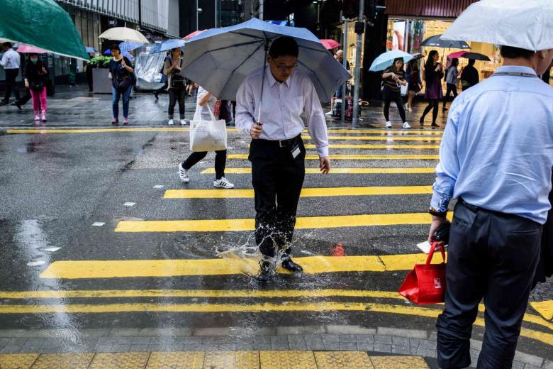 Hong Kong braces itself for first storm this year as Merbok approaches ...