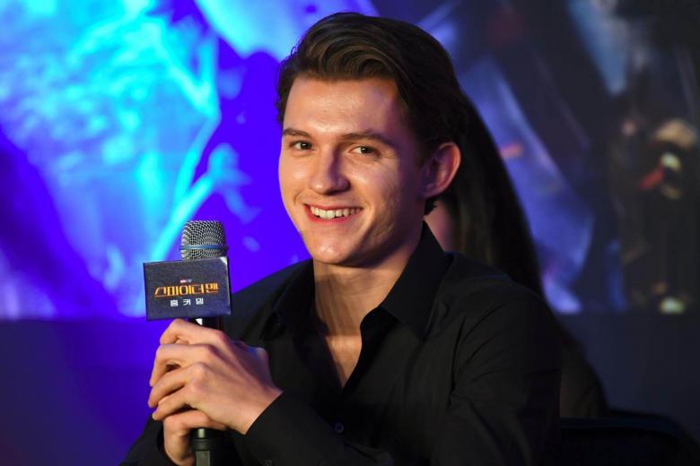 Movie review: Tom Holland totally owns the Spider-Man role in ...