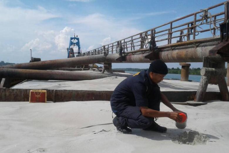 Malaysian maritime agency intercepts Chinese ship with stolen sand ...