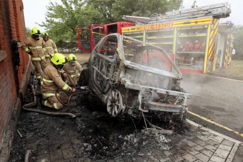 Electric car in Britain bursts into flames while charging overnight ...