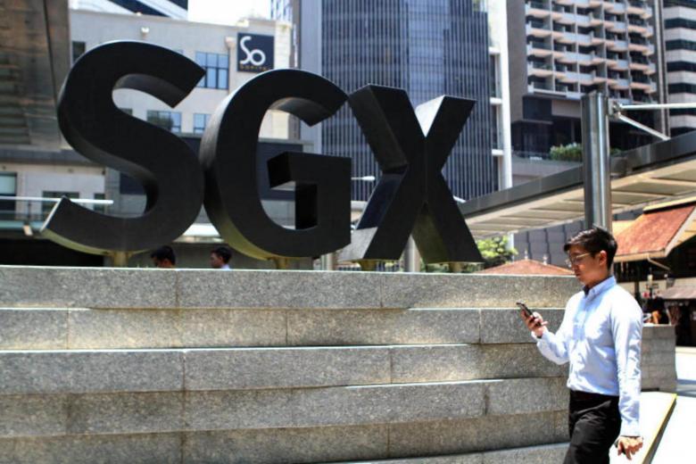 Singapore's biggest stock market listing in six years debuts just above ...