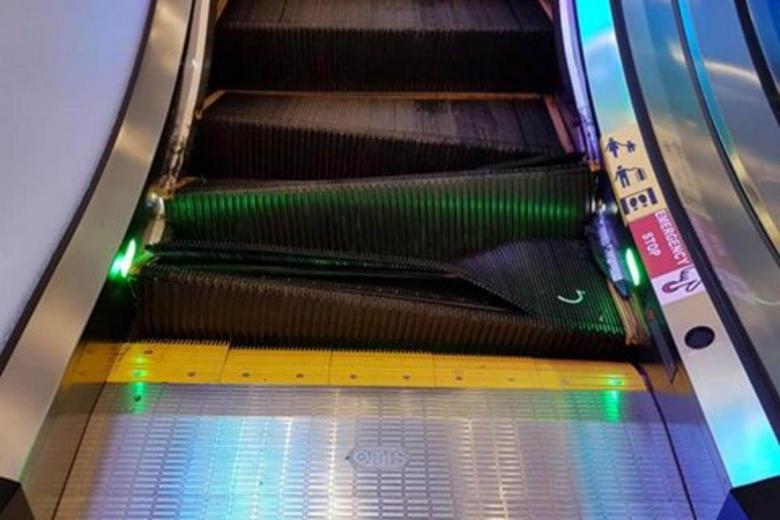 Woman leaps off escalator at The Centrepoint seconds before steps ...