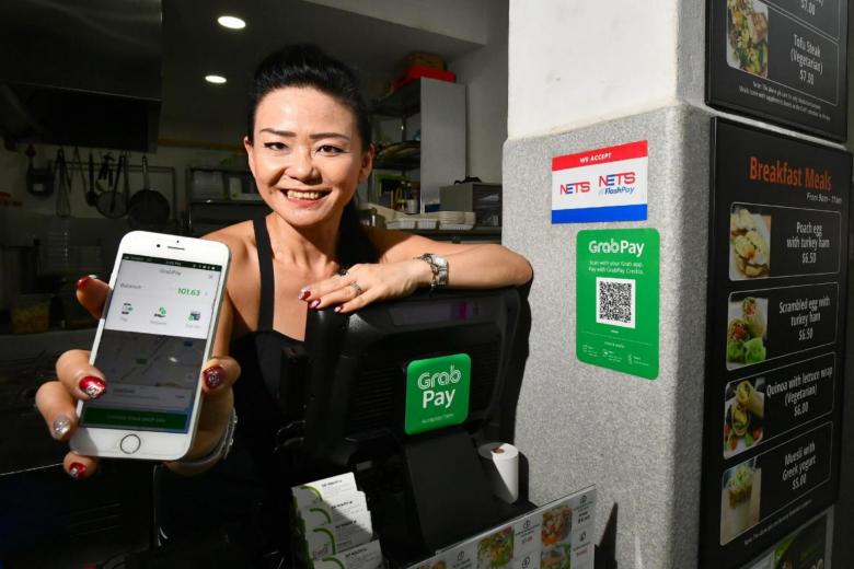 Grab's e-wallet lets users pay for food items | The Straits Times