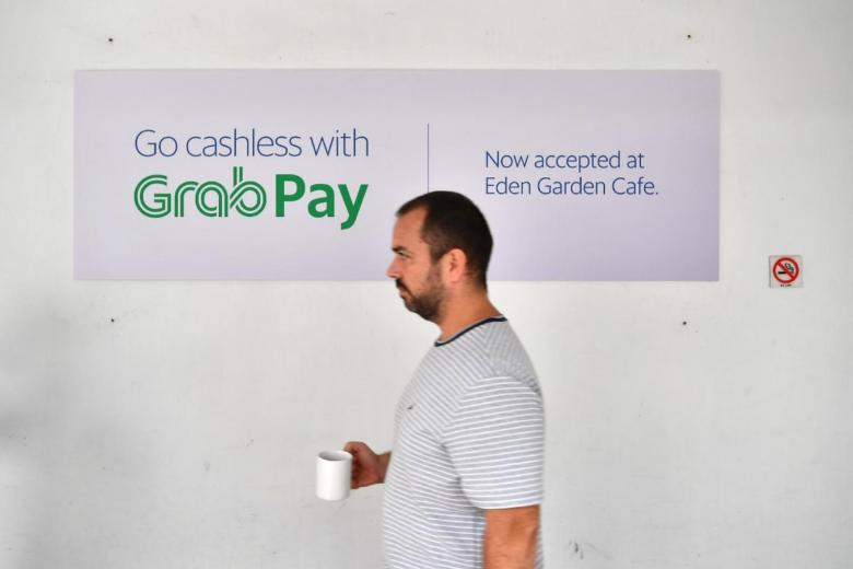 Grab's e-wallet lets users pay for food items | The Straits Times
