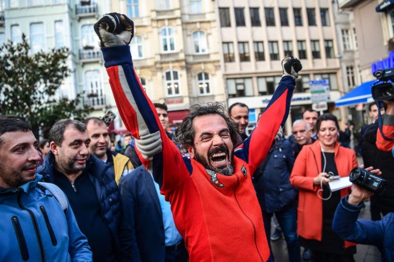 Turkish daredevil jumps 36m from Istanbul's Galata Tower in modern ...