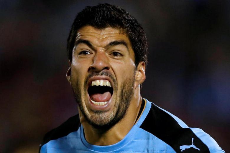 Malaysia defends tourism role for 'biting' footballer Suarez | The ...