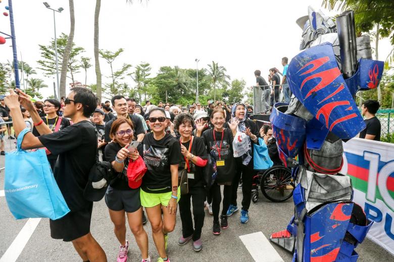 Runners and robots take over Sentosa beach for first ever Transformers ...