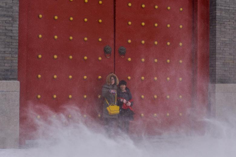 China renews cold front alert as heavy snow continues to wreak havoc ...