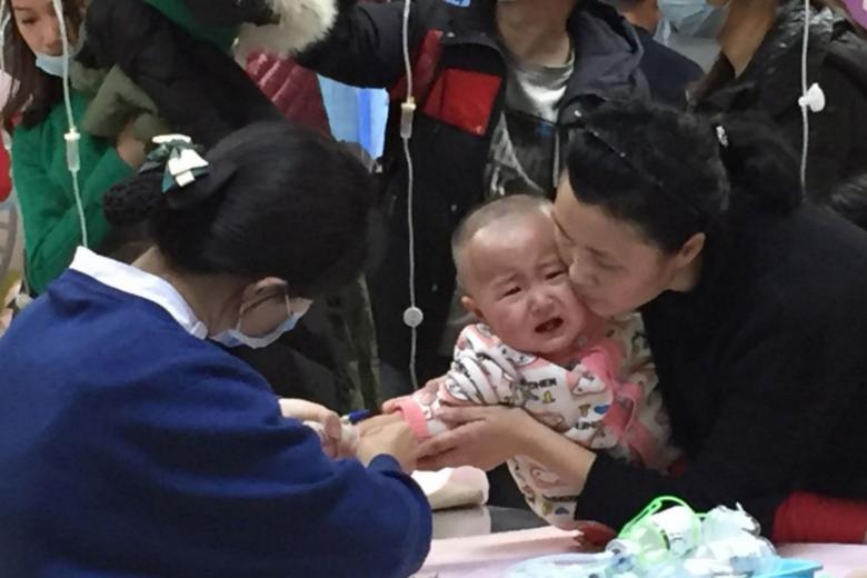 China's flu season trailing off but one hospital has to close clinic ...