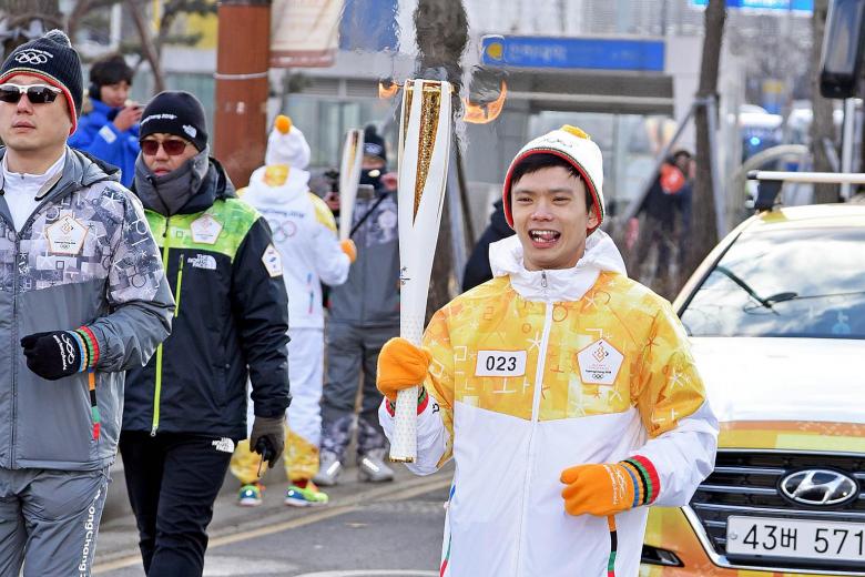 Winter Olympics: Speed skater Lucas Ng thrilled with torchbearer ...