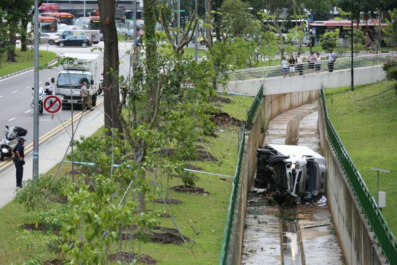 Lorry crashes into canal in Lower Delta Road; driver taken to hospital ...