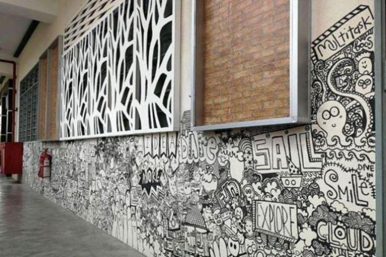 Malaysian teacher's 'vandalism' on school wall goes viral | The Straits ...