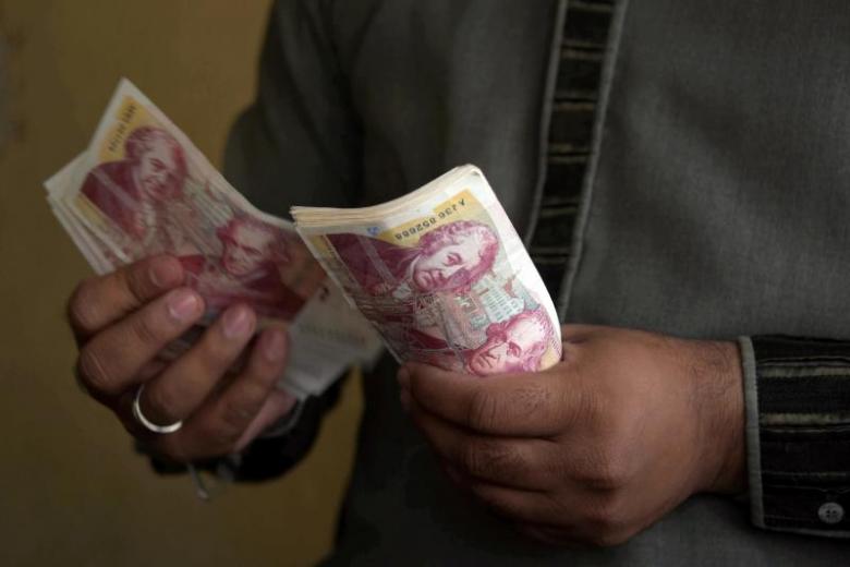 Cash is far from dead and its use is rising: BIS | The Straits Times