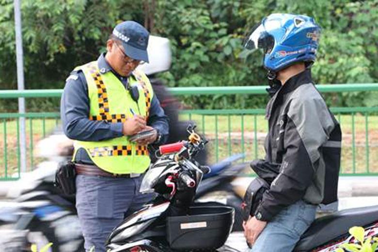 NEA nabs 197 motorcyclists at checkpoints for smoky, noisy foreign ...