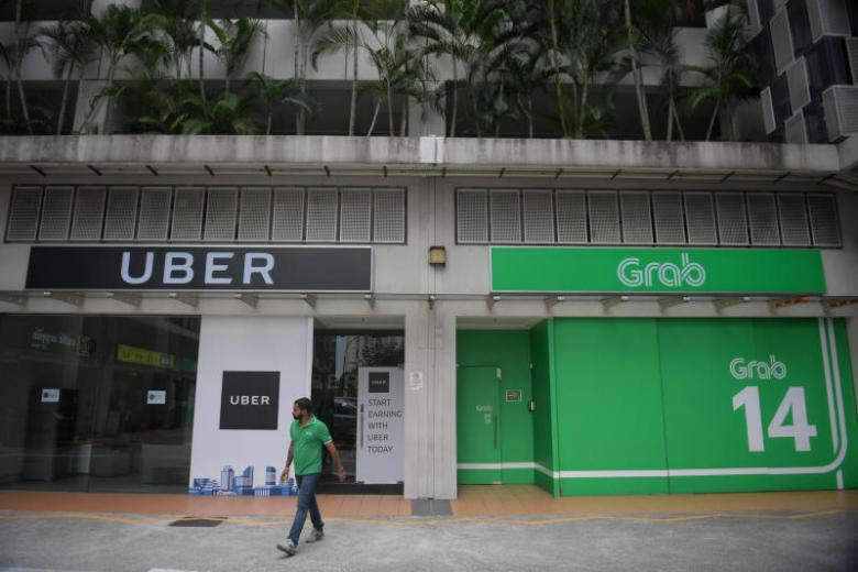 Competition watchdog investigating if Grab-Uber merger will ...