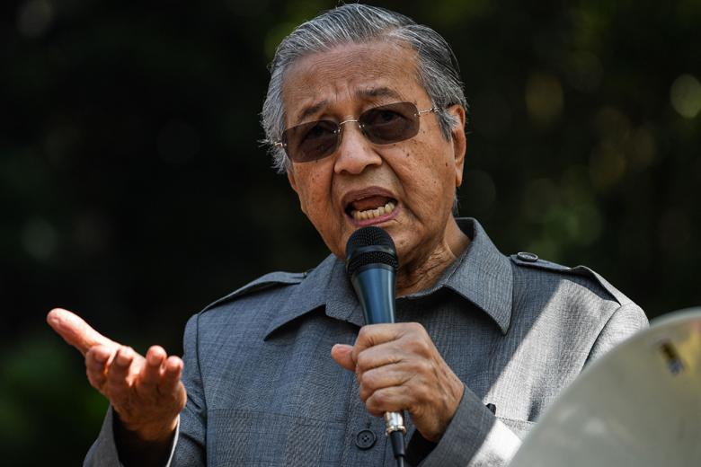 Mahathir's party told by Malaysian authorities to suspend activities ...
