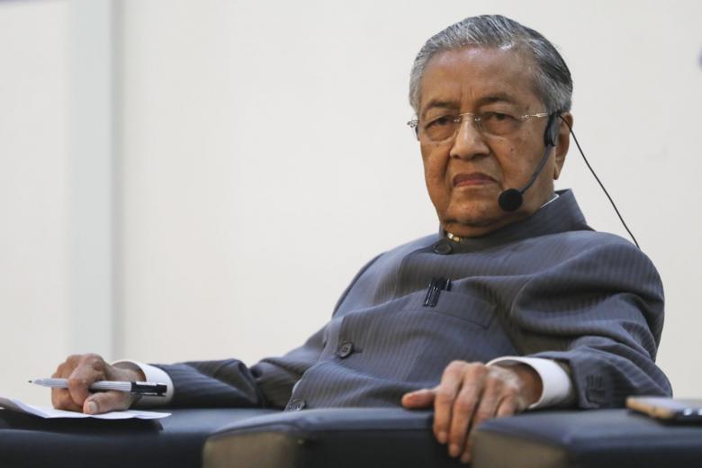 Mahathir defies ban, says party will continue to use name and logo for ...