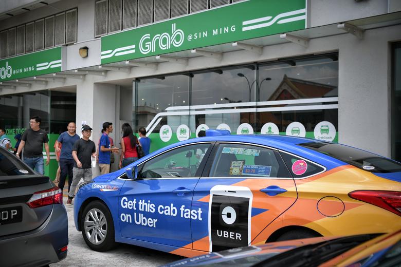 Competition watchdog issues interim measures to stop Grab, Uber merger ...