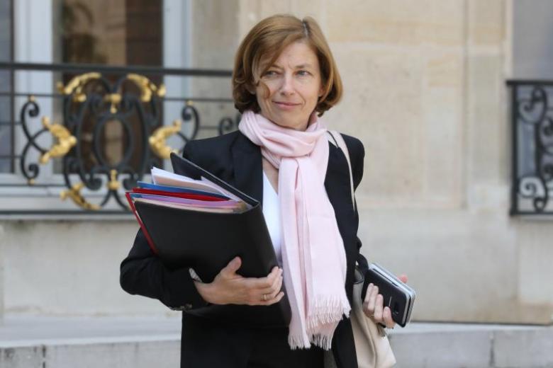 France charges two ex-spies with passing secrets to 'foreign power ...