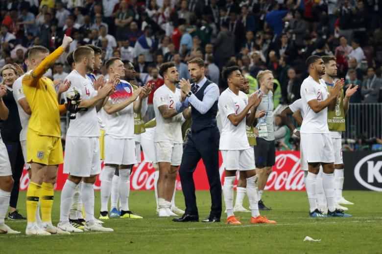 Football: British media laud shattered but lion-hearted England team ...