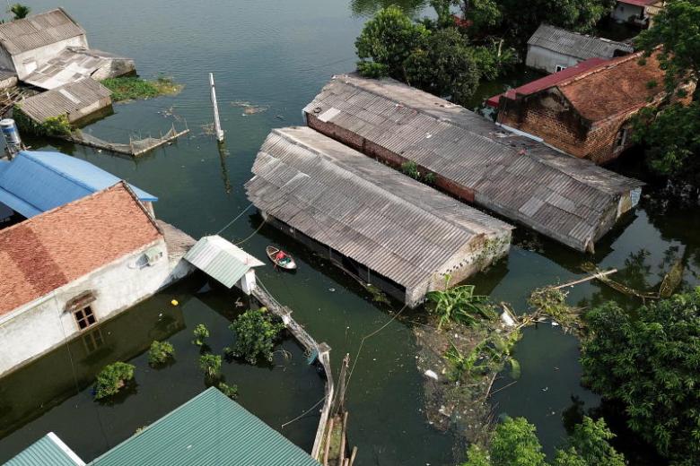Hanoi considers evacuation of 14,000 households after heavy rain | The ...