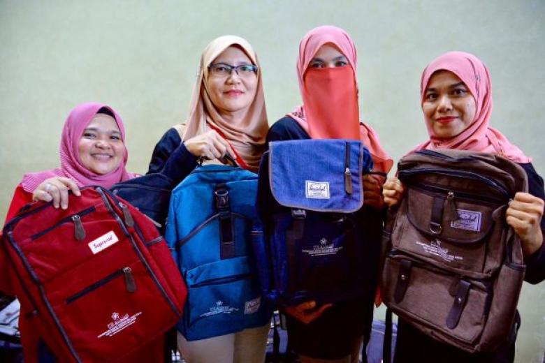 Select delegates get eye-catching backpacks at PPBM general assembly ...