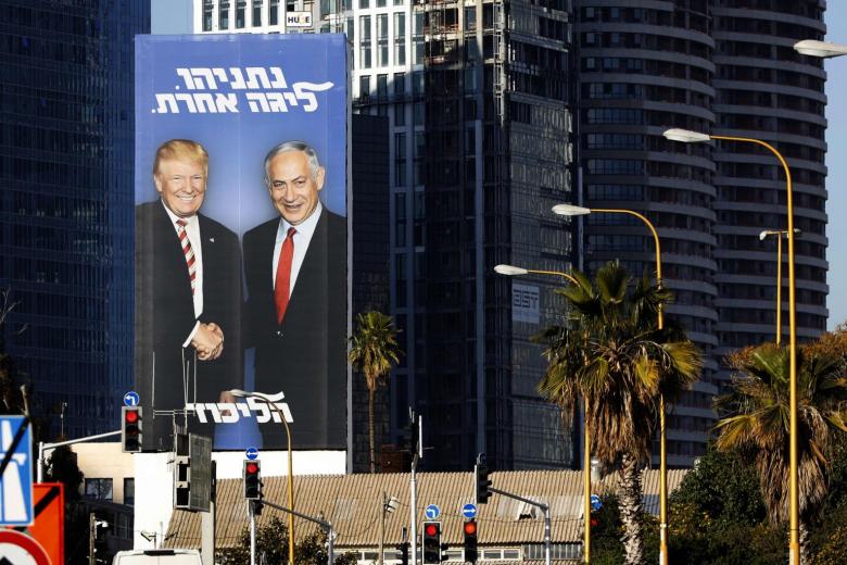 Benjamin Netanyahu, Donald Trump grin down on Israelis in giant ...