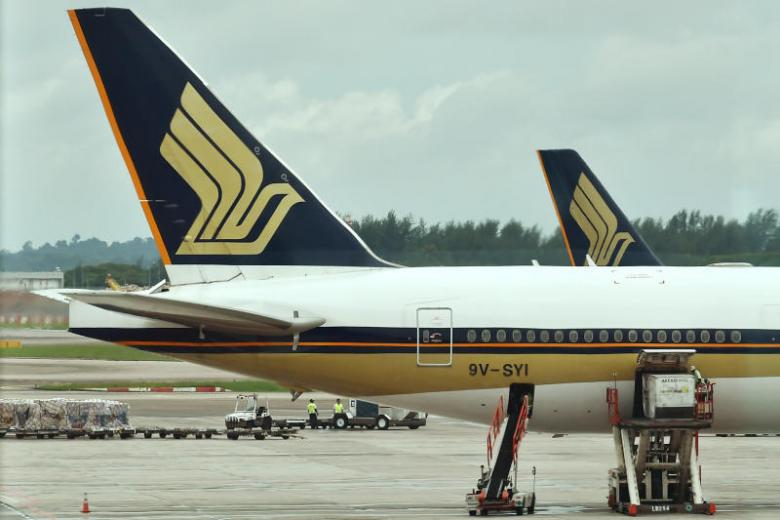 SIA captain, stewardess grounded after she sat in first officer's chair ...