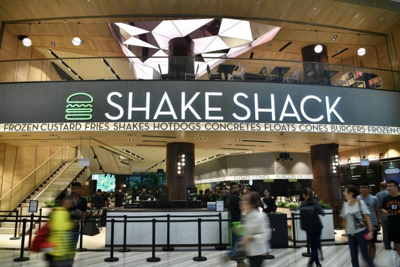 Snaking queue forms outside NY burger chain Shake Shack at Jewel Changi ...