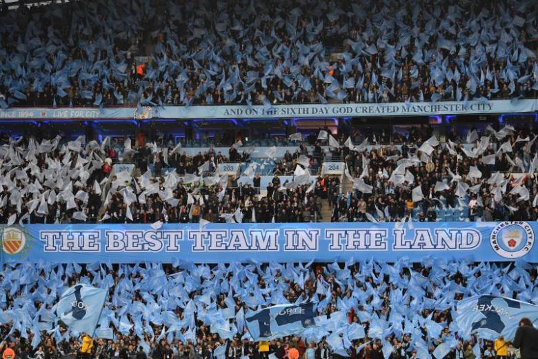 Football: Manchester City stars pay for 26 coaches to take fans to ...