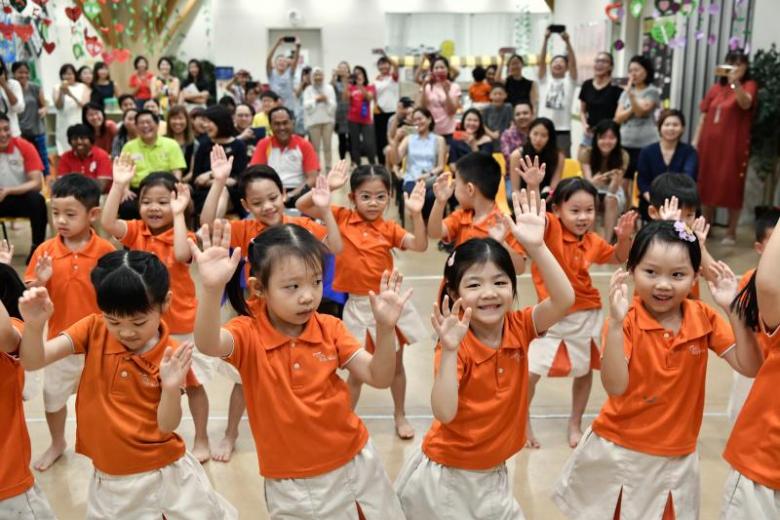 Pre-schoolers show their appreciation to their domestic helpers at NTUC ...