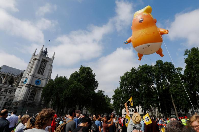 'Trump baby' balloon flies outside British parliament as big protests ...