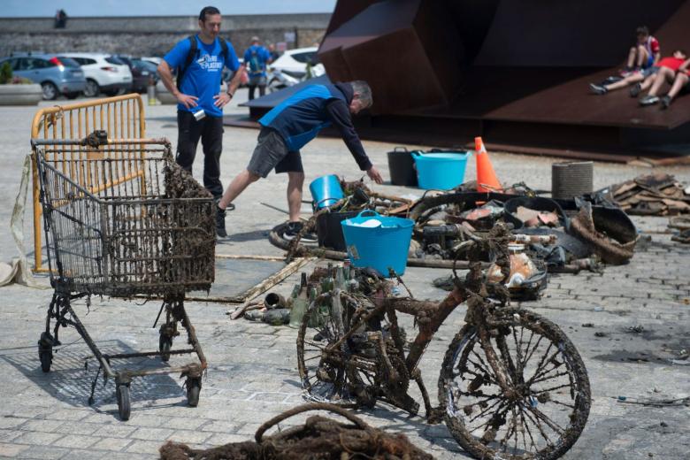 Thousands of volunteers remove plastic from northern Spanish coast for ...
