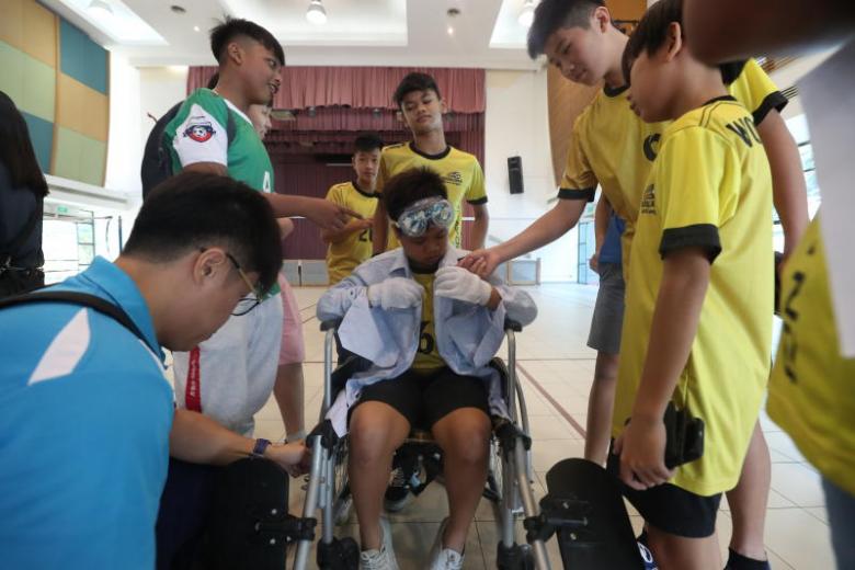 Youth football players scoring on empathy | The Straits Times