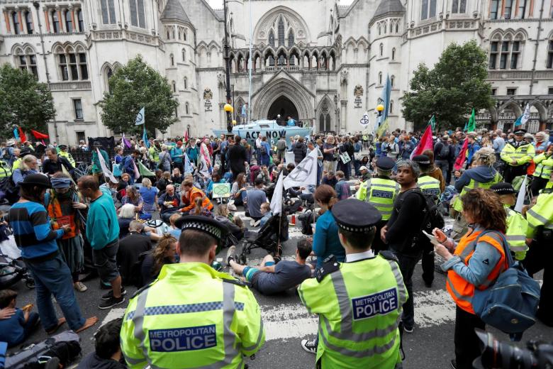 Climate activists disrupt five British cities with 'summer uprising ...
