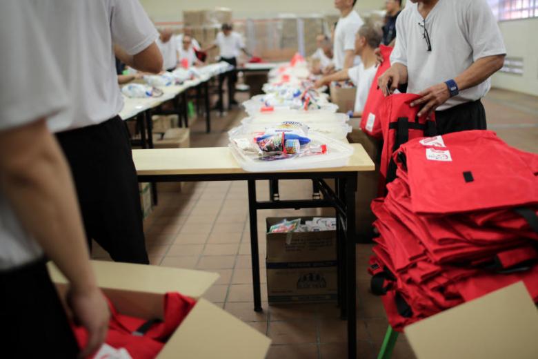 Changi Prison inmates volunteer to pack 50,000 funpacks for this year's ...