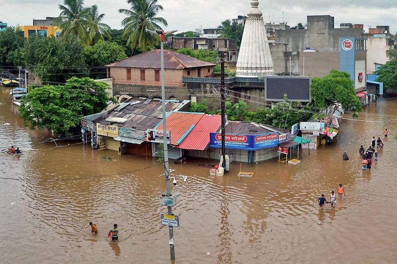 Floods in India kill 33, displace thousands | The Straits Times