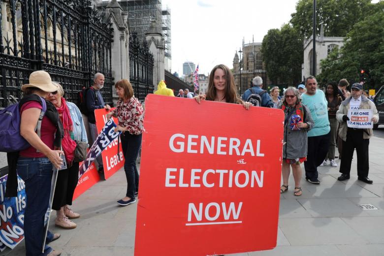 British government schedules new vote on snap election | The Straits Times