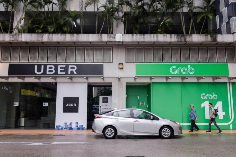 Grab says Uber acquisition not in breach of competition laws as ...