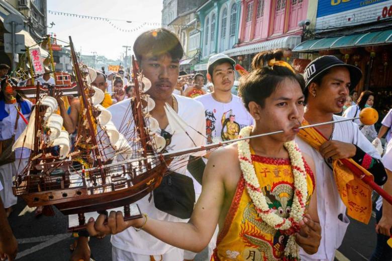 Phuket hosts cheek-piercing vegetarian festival | The Straits Times