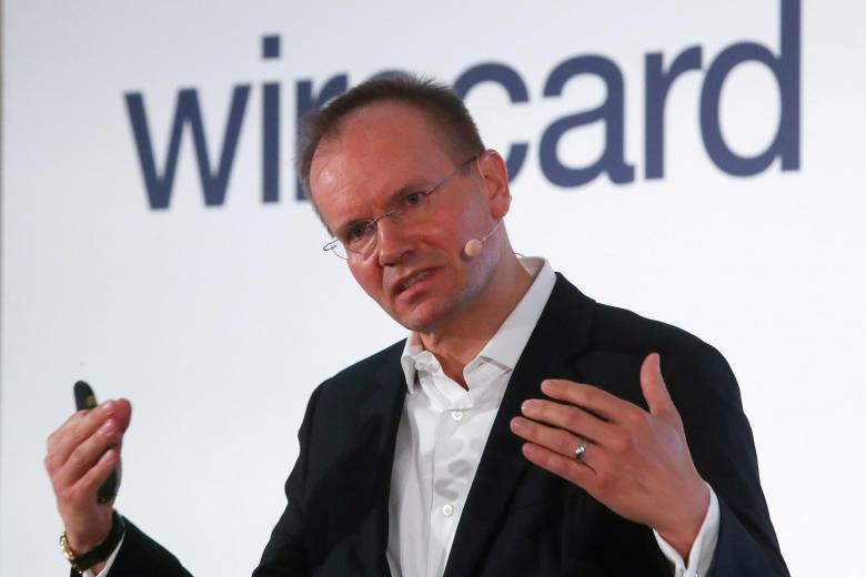 Wirecard expects to be cleared in Singapore police probe, widens KPMG ...