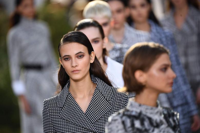 Chanel walks models through a tranquil cloister garden in Paris | The ...