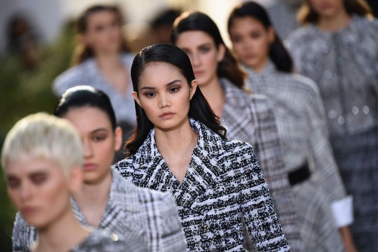 Chanel walks models through a tranquil cloister garden in Paris | The ...