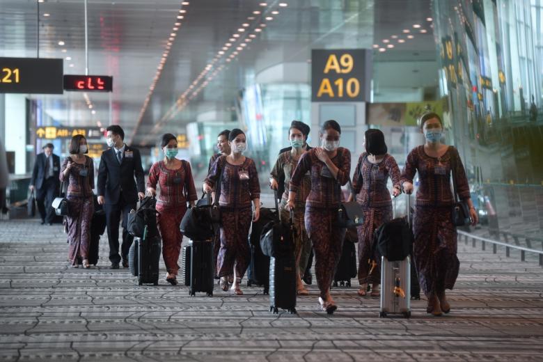 SIA cabin crew to wear surgical masks on board as safety precaution ...