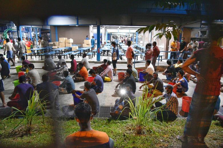 Coronavirus: Workers describe crowded, cramped living conditions at ...