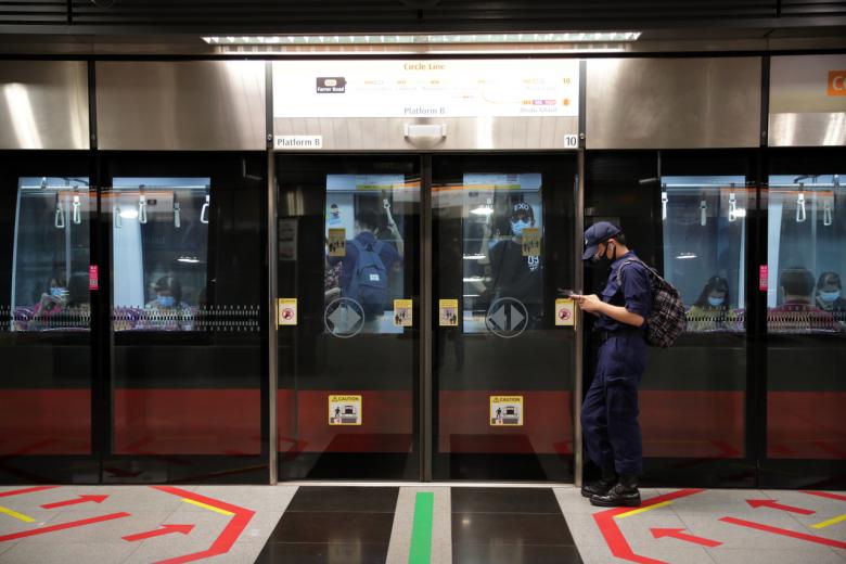 At least 350,000 still commuting to work in Singapore after reduction ...