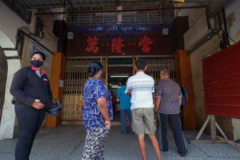 Coronavirus: Rush on pawnshops as cash-strapped Malaysians hock valuables | The Straits Times